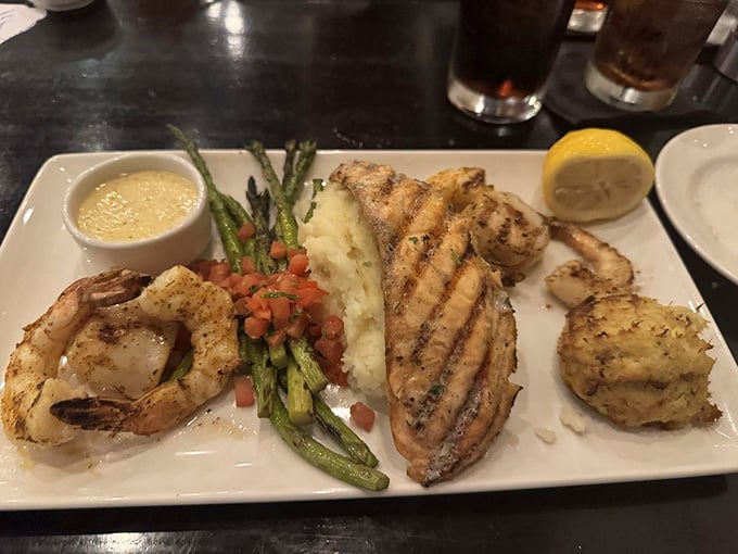 This seafood mixed grill brings shrimp, fish, and asparagus together like a delicious coastal family reunion on one plate.