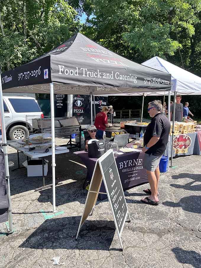 Food trucks at farmers markets are basically the best of both worlds, and yes, that pizza smells exactly as good as it looks.