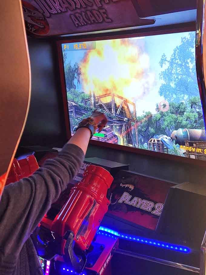 Nothing says stress relief quite like blasting away at a shooting game with a bright red plastic gun.