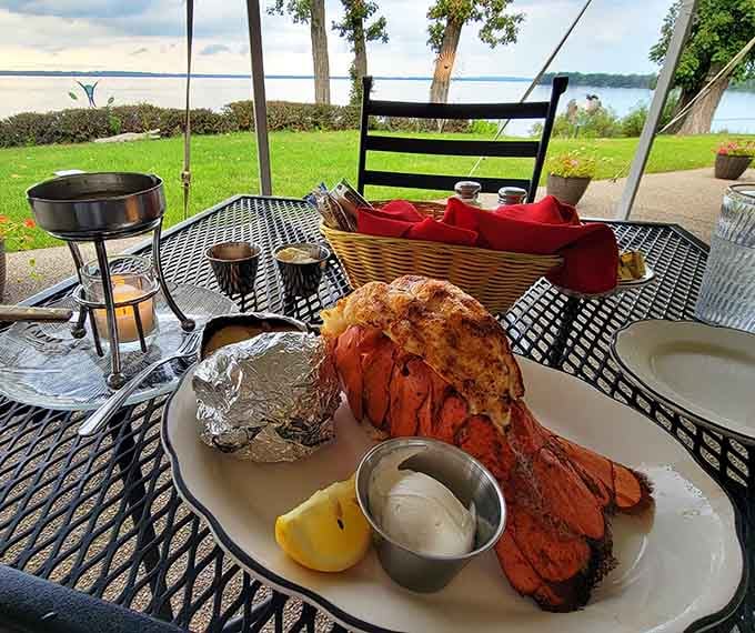 That lobster tail overlooking the lake is living its best life, and so will you when you order it.
