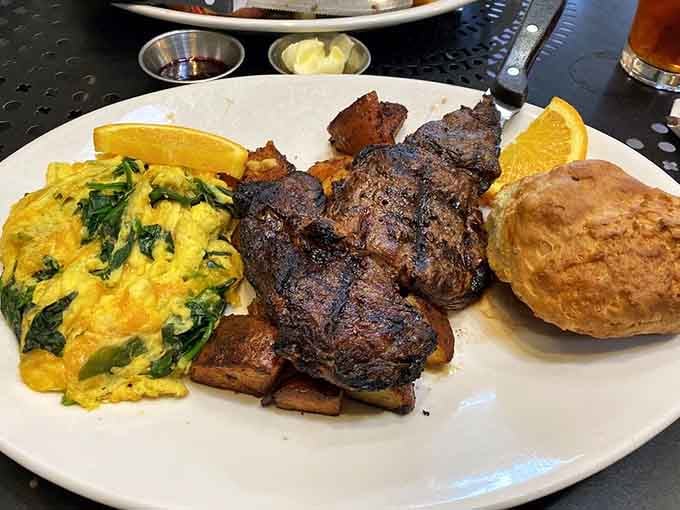 Steak and eggs with a biscuit, because sometimes you need breakfast that means business and delivers on promises.