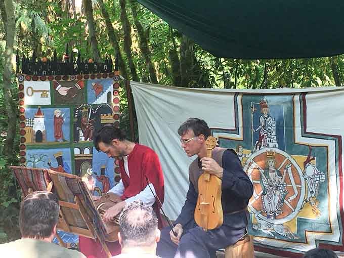 Period instruments fill the forest air with melodies that predate electricity by several hundred years, naturally.