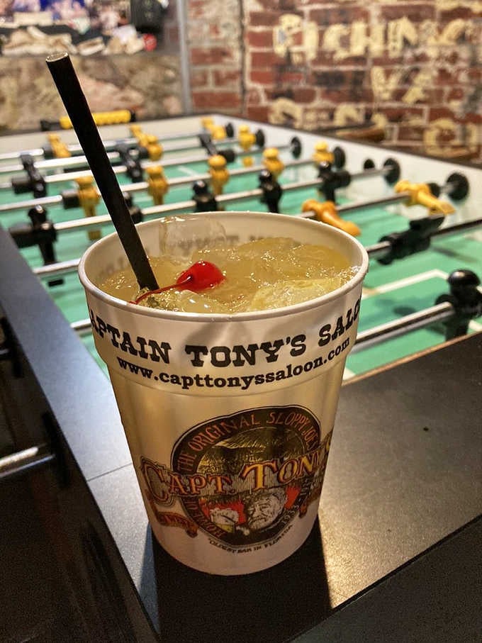 Nothing says Key West quite like a tropical drink served in a souvenir cup near a foosball table.