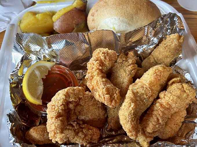 Golden fried catfish that would make any Southern grandmother nod approvingly, complete with all the fixings you need.