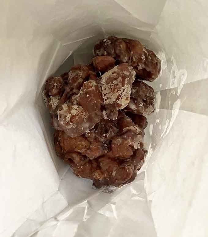 These apple fritters aren't messing around, packed with enough fruit and glaze to justify calling them a balanced breakfast option.