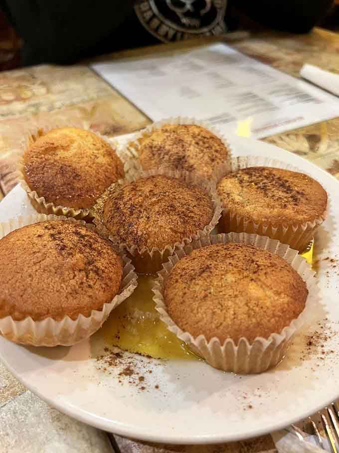 These cornbread muffins arrive like little golden treasures, warm and ready to make everything else taste even better.