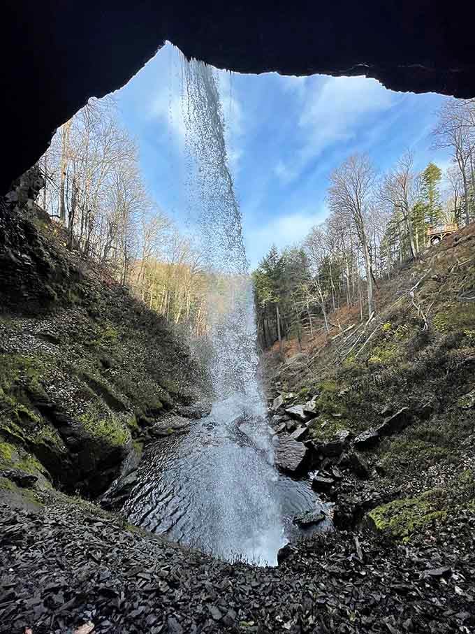 Standing behind a waterfall is like being inside nature's snow globe, minus the tacky souvenir shop markup.