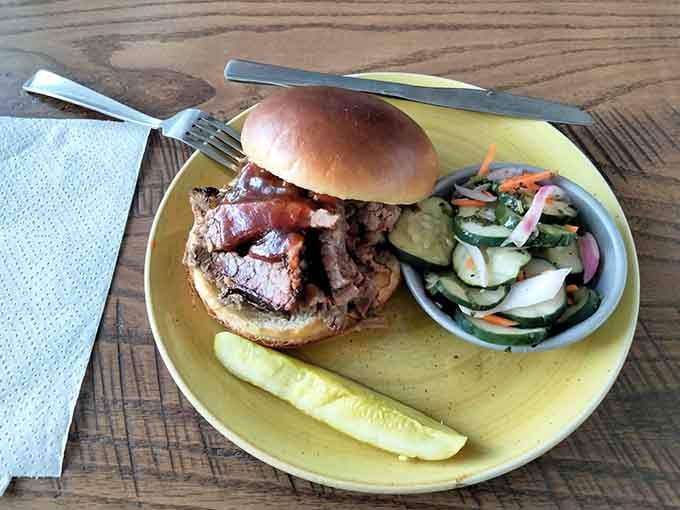 That brisket burger is stacked so high, you might need an engineering degree to figure out the approach.