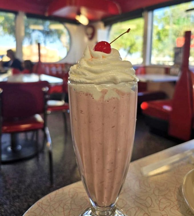 That cherry on top isn't just decoration, it's a promise that everything underneath is worth the calories.