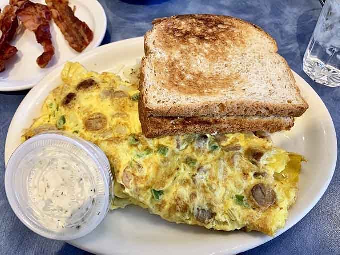 This fluffy omelet with perfectly crispy hash browns is what breakfast dreams are made of, no exaggeration needed.