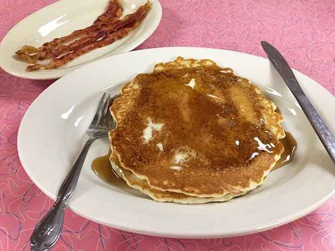 Fluffy pancakes drizzled with syrup alongside crispy bacon is the breakfast duo that never goes out of style.