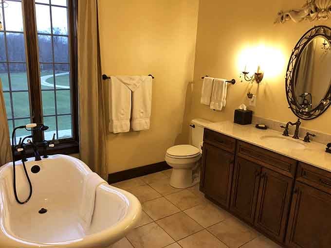 That soaking tub by the window offers castle views your regular bathroom could never compete with.