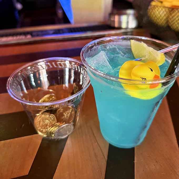 A rubber ducky floating in your bright blue cocktail? Now that's what we call whimsical refreshment done right.
