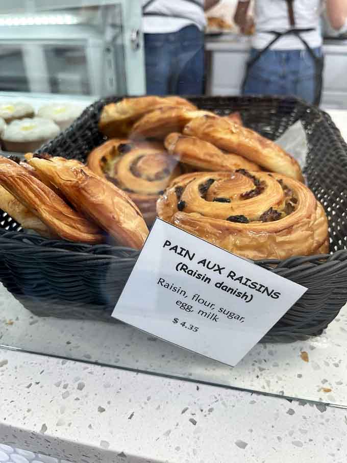 Pain aux raisins that spiral into sweet, buttery perfection because sometimes Danish pastries deserve a French accent.