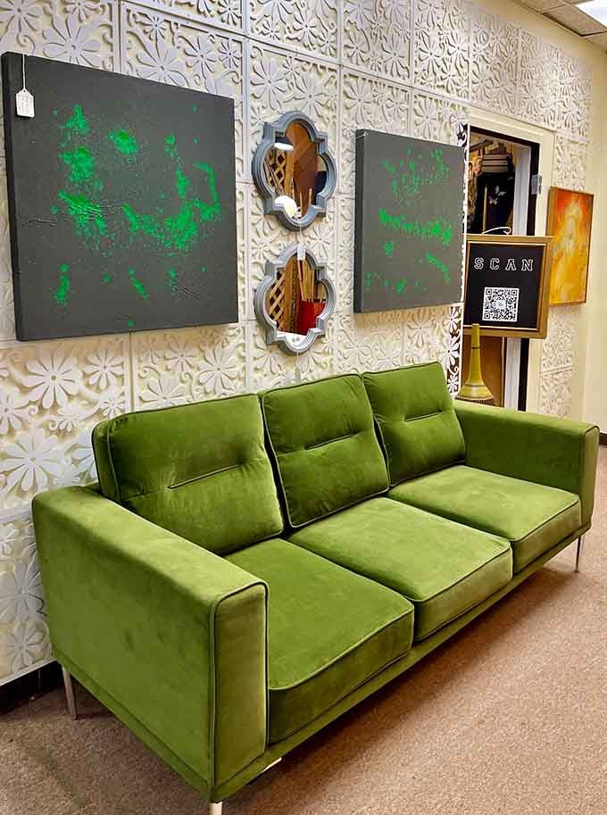 That green velvet sofa screams 1970s sophistication, perfect for looking contemplative while sipping something from a crystal decanter.