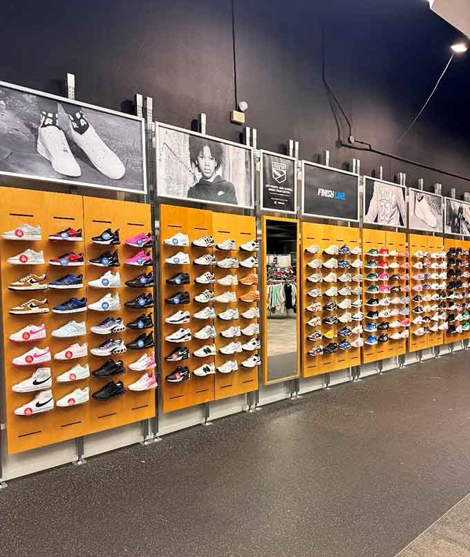 Rows of sneakers displayed like art in a gallery, except this museum lets you take everything home.