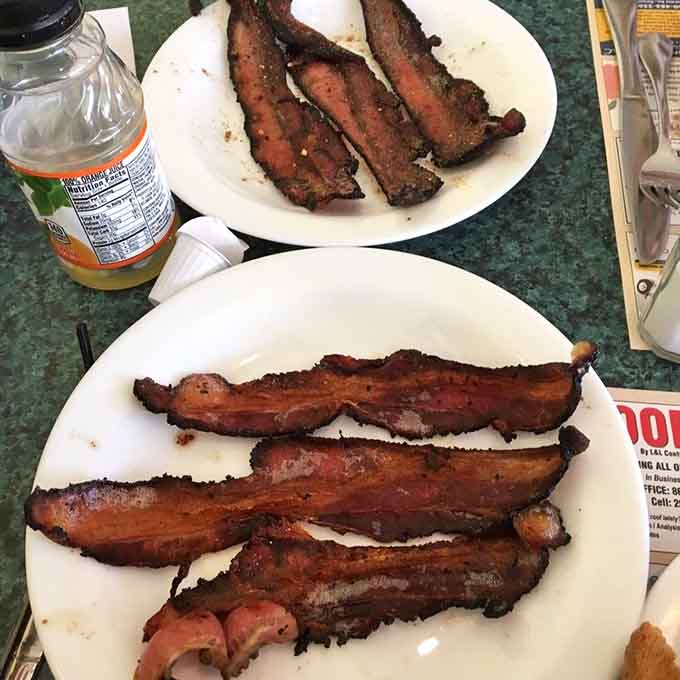Bacon so thick and perfectly crisped it deserves its own zip code and possibly a standing ovation.