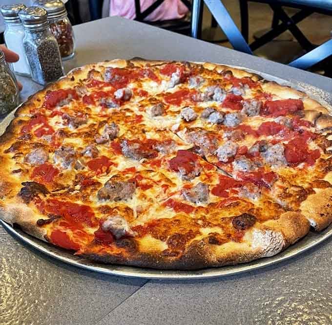 Sausage and garlic create a flavor combination that'll make you forget every other pizza you've eaten.