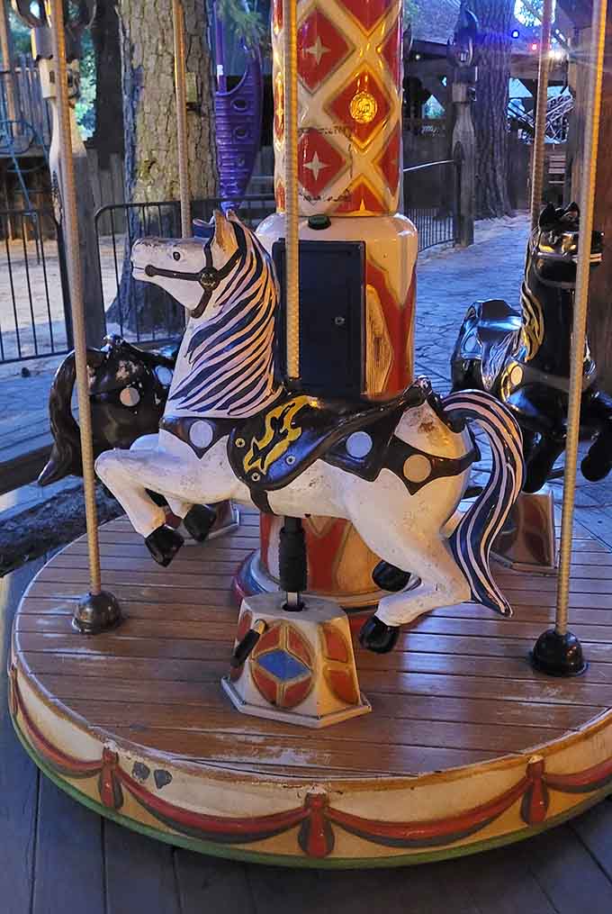 A carousel with Western-themed horses, because even cowboys need to spin around occasionally for fun.
