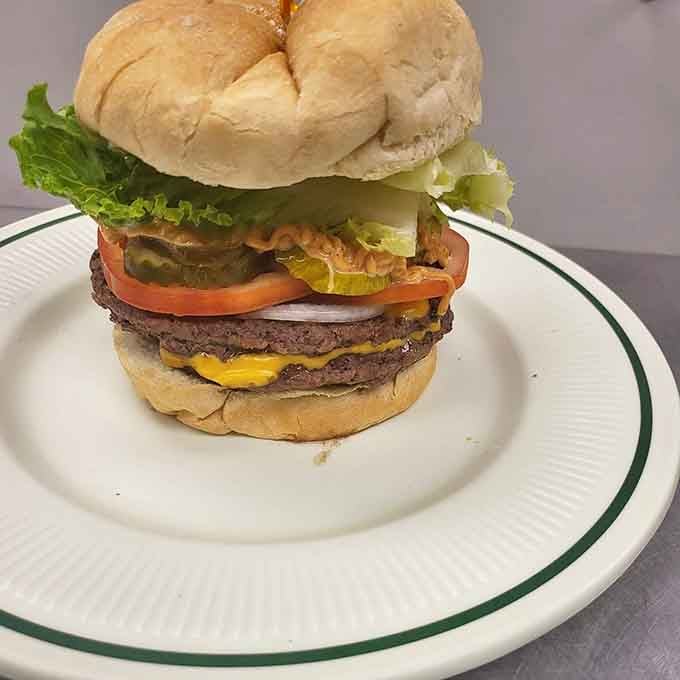 This towering masterpiece makes you wonder if you should've stretched before ordering such ambitious lunch goals.