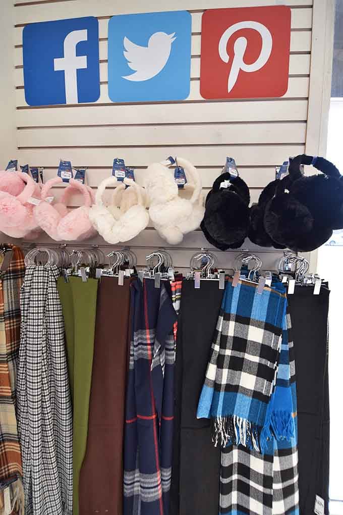 Fuzzy earmuffs and plaid scarves hang ready to keep you cozy without freezing your budget solid.