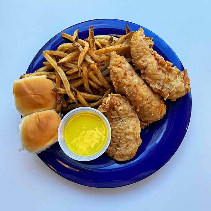 Tender, juicy chicken strips with that honey mustard sauce that deserves its own fan club and newsletter.