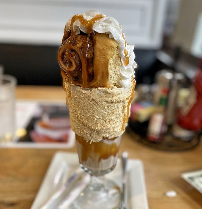 The Cinnabon shake arrives looking like it raided a bakery and won, dripping with caramel and pure indulgence.