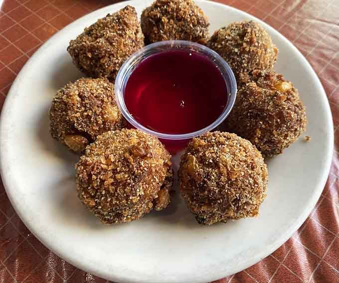 Golden corn fritters with a prickly pear dipping sauce prove that Arizona knows how to do appetizers right.