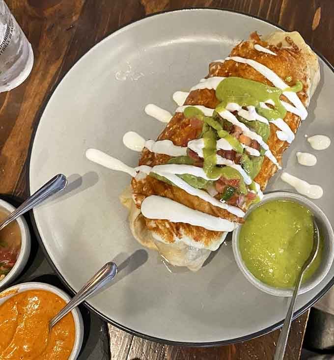 Breakfast wrapped in a tortilla and topped with avocado is how mornings were always meant to begin, friends.