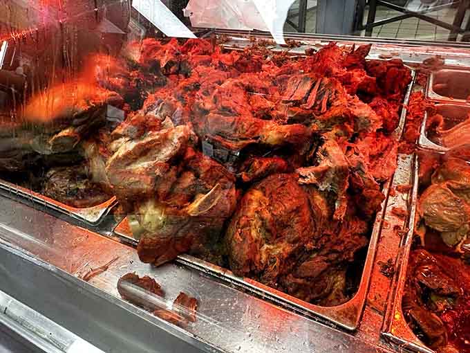 Those carnitas glisten like edible treasure, crispy-edged and fall-apart tender in all the right ways.