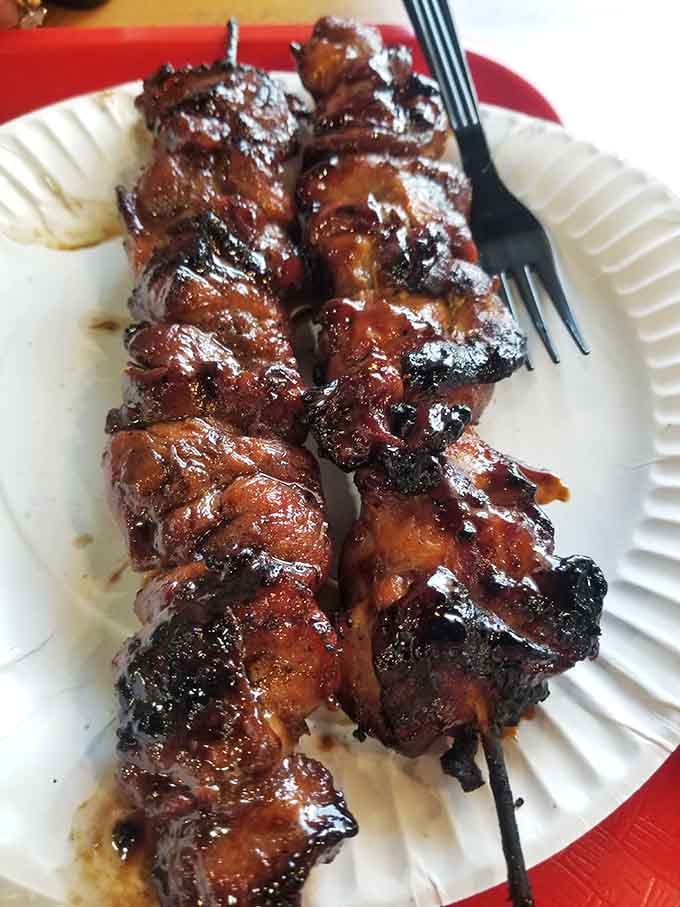 Skewered pork perfection with that caramelized exterior that makes your mouth water just looking at the photo evidence.