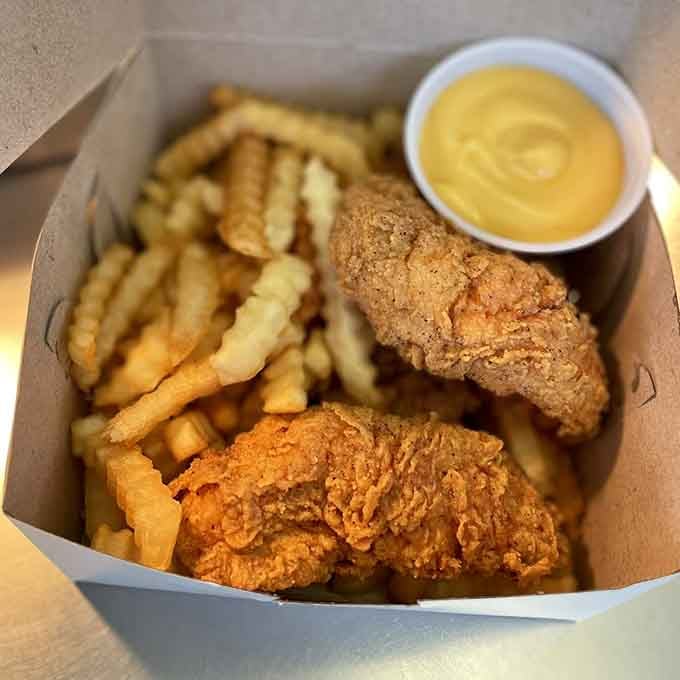 Chicken tenders and fries in a box: proof that sometimes the simplest pleasures are the most satisfying ones.