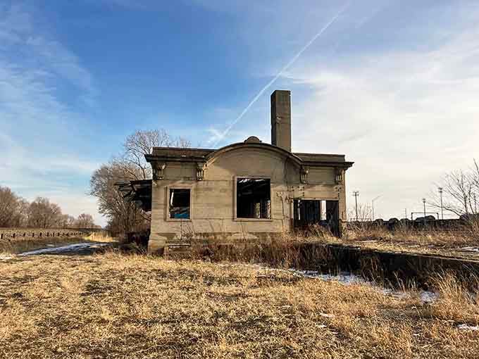 Standing alone in an empty field, this building waits patiently for its next chapter to begin.