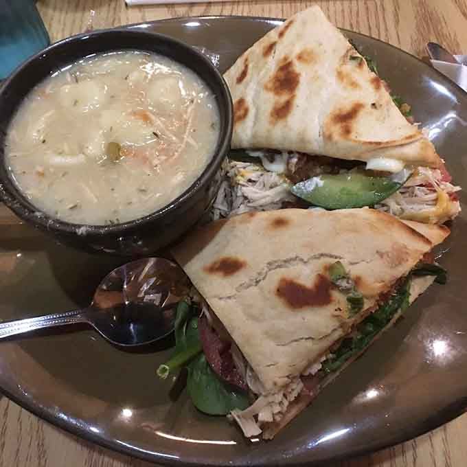 Turkey, bacon, and avocado melt together between grilled bread, served with creamy soup that warms you inside out.