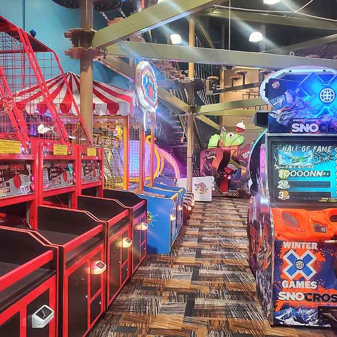 Carnival games and ticket dispensers line up like soldiers ready to separate parents from their quarters gleefully.