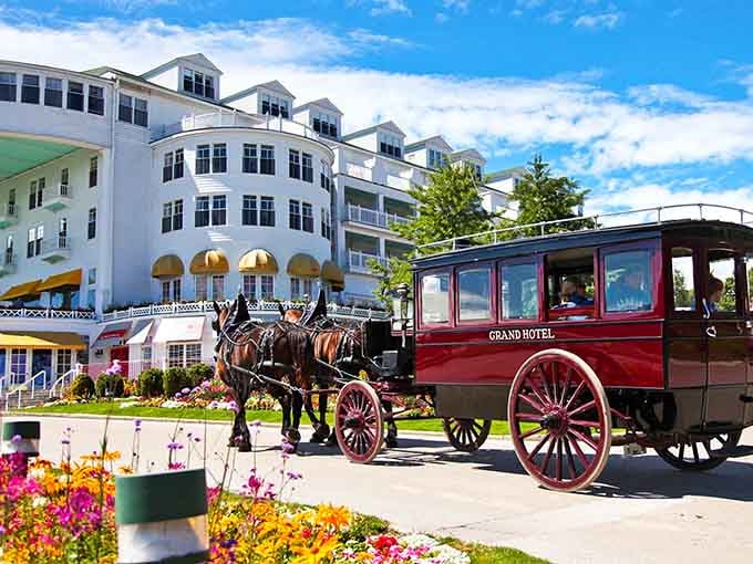 Horse-drawn carriages still rule these streets, delivering guests in style since automobiles got their walking papers back in 1898.