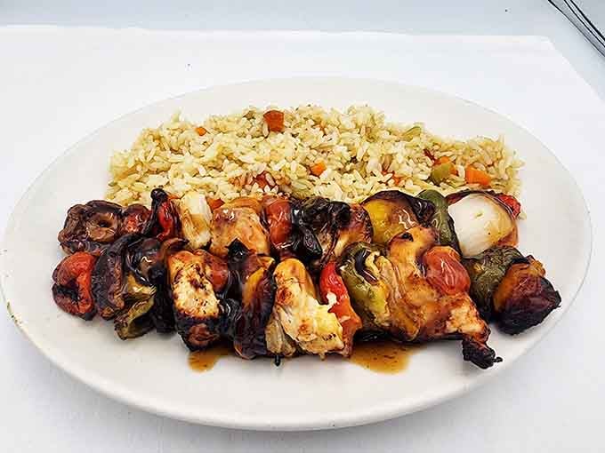 Chicken kabobs with vegetables that somehow make healthy eating look like the best decision you'll make all week.