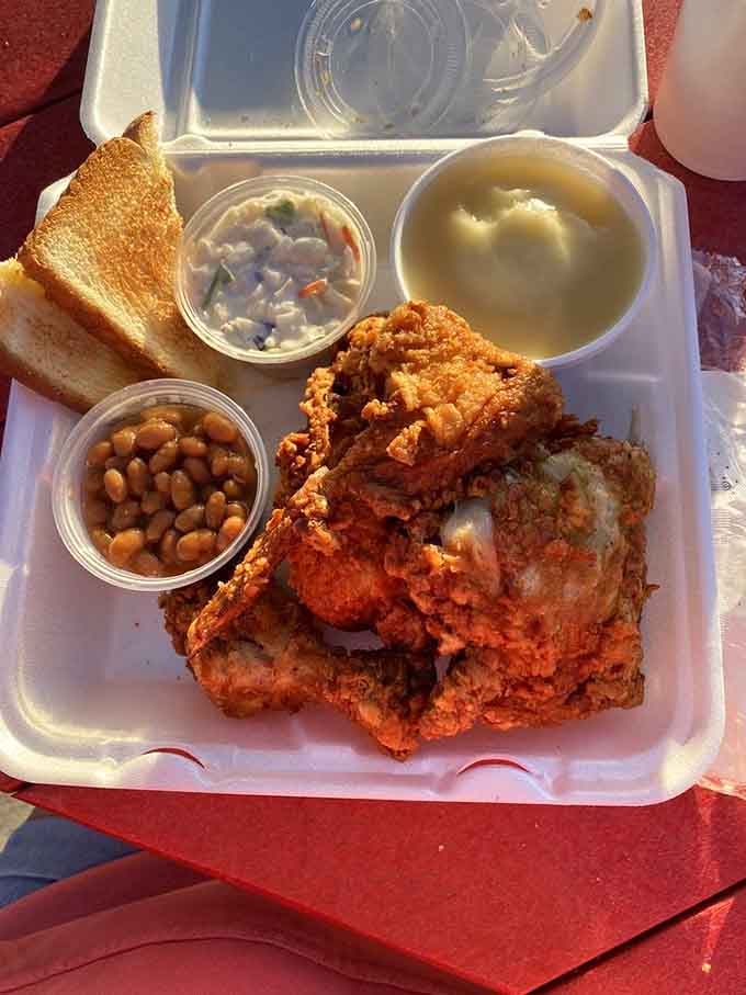 Toast, coleslaw, baked beans, mashed potatoes, and chicken&mdash;this is what comfort looks like in styrofoam form.