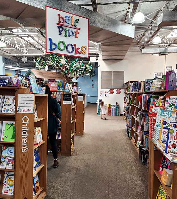 The children's section sign practically glows with promise, like a literary Disneyland for the picture book set.
