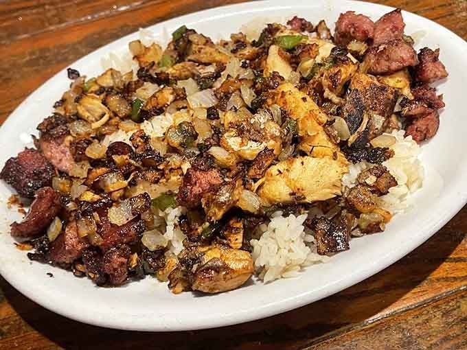 Salmon meets sausage over rice in a flavor combination that shouldn't work but absolutely does.