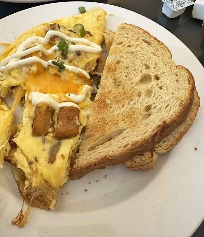 That golden scramble with a side of perfectly toasted bread proves simple done right beats fancy done wrong every time.