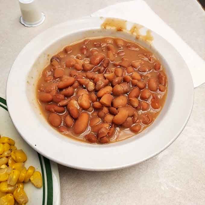Pinto beans swimming in rich broth, the unsung hero that makes every Southern meal feel complete and honest.