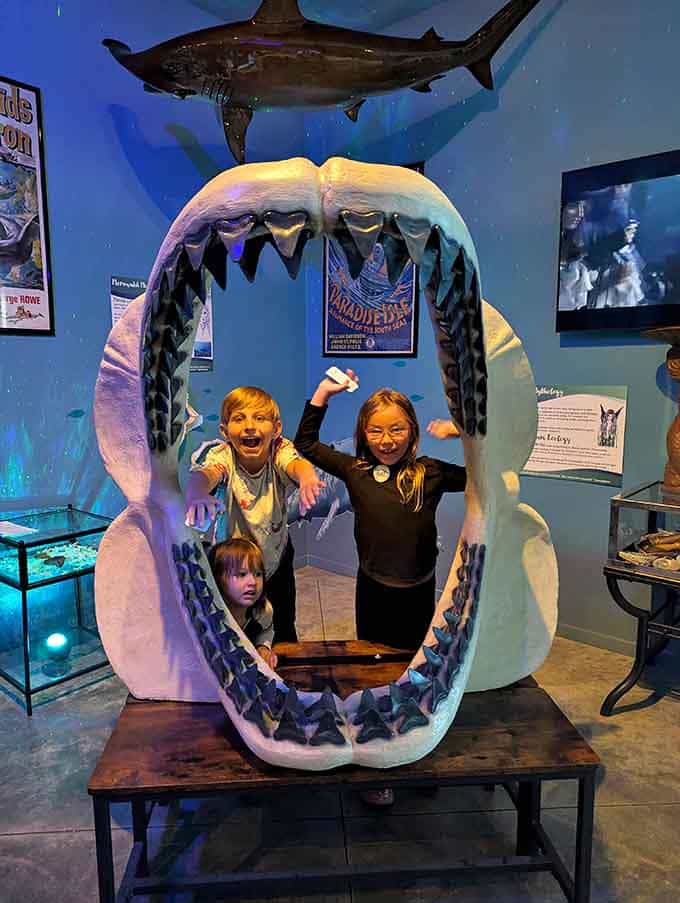 Nothing says "family photo opportunity" quite like posing inside a giant shark's mouth with the kids.