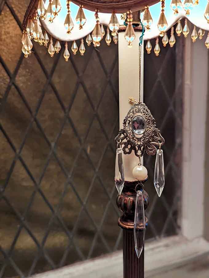 Victorian elegance meets supernatural intrigue in decorative details that set the perfect mood for ghostly encounters ahead.