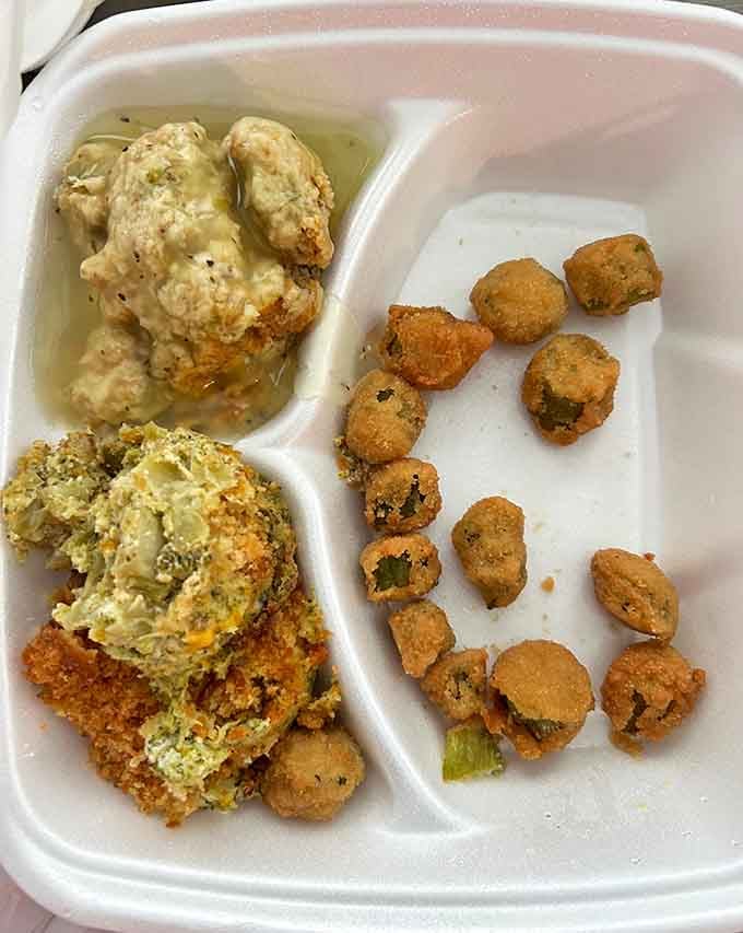 A vegetable plate with fried okra and squash casserole demonstrates that Southern sides deserve equal billing with any entree.