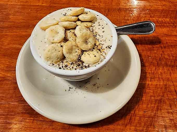 Creamy New England chowder topped with oyster crackers, the kind that warms you inside and out.