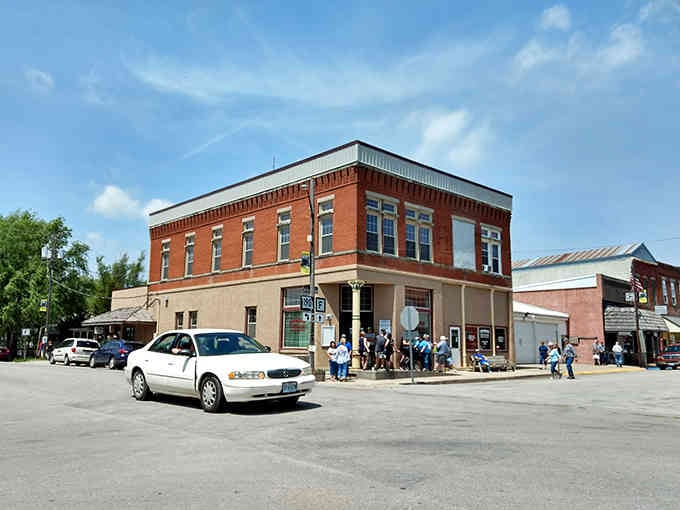 That two-story brick beauty draws crowds like a magnet, and those awnings provide perfect shade for patient shoppers.
