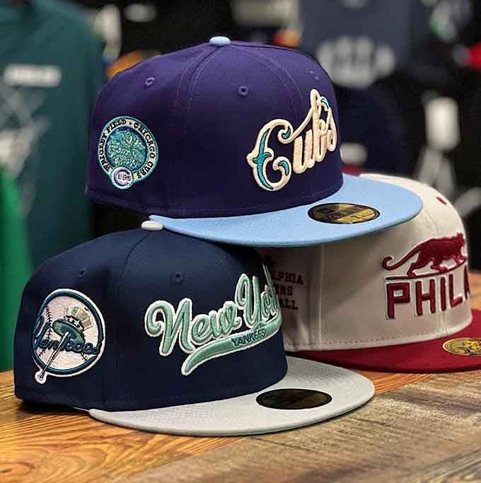 Baseball caps displaying team pride let you rep your city without paying stadium concession stand prices for merchandise.