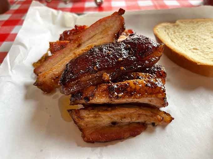 Glazed pork belly glistening on white bread is the kind of simple perfection that makes you forget your diet existed.