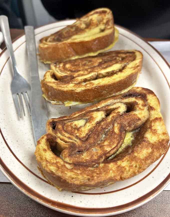 Cinnamon swirl French toast that looks like edible art and tastes even better than it photographs, honestly.